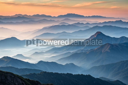 Layers of Mountain Ridges Partially Covered in Mist | Imagem de IA ...