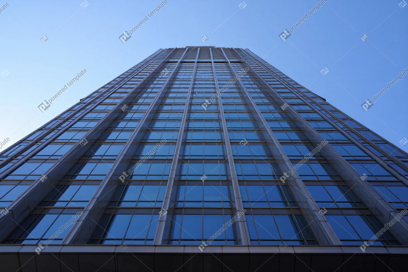 Tall Skyscraper with Glass Facade Reflecting Blue Sky | AI Image ...